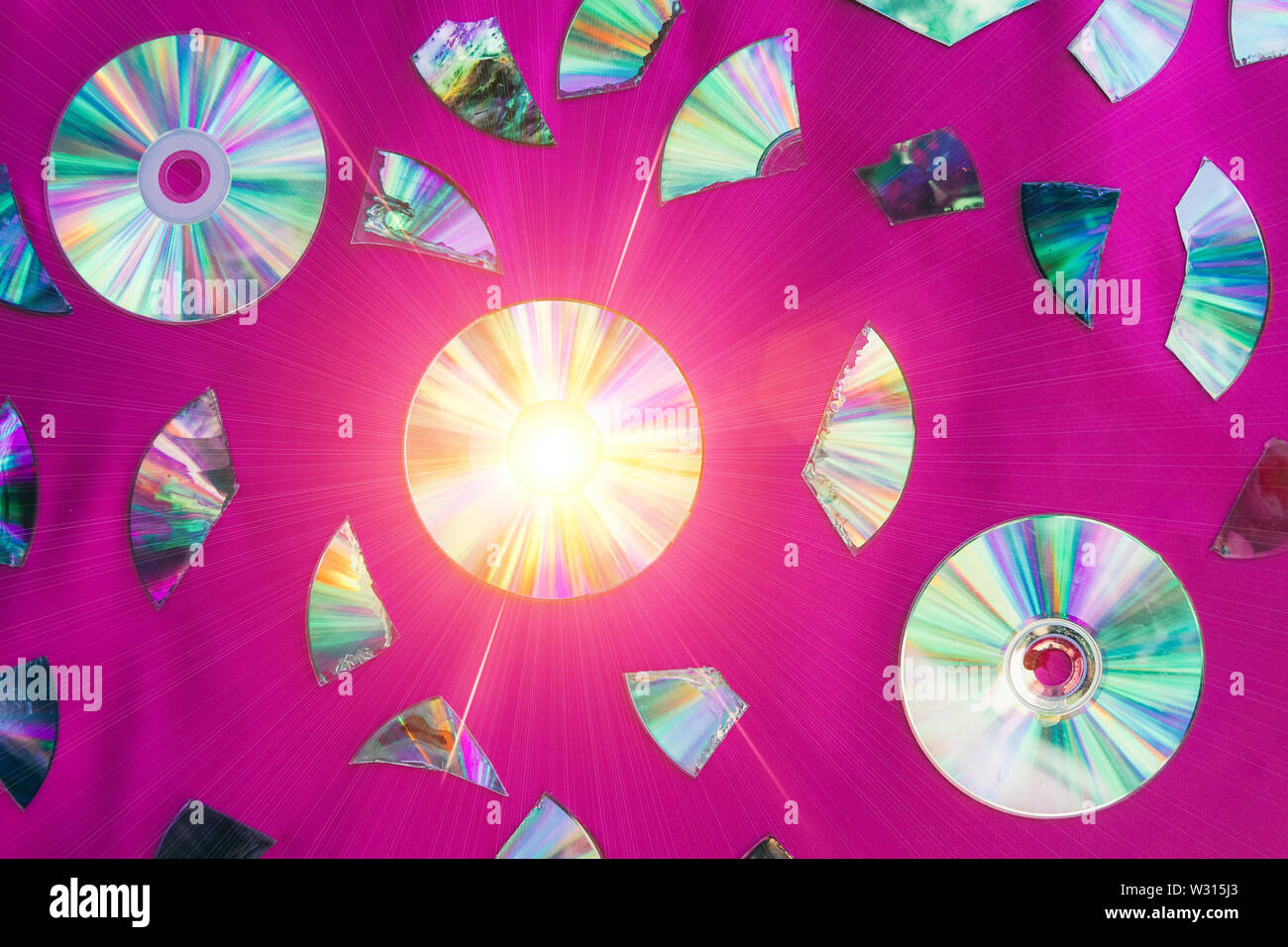 Vintage CD or DVD disk background, old circle discs and treir parts ...