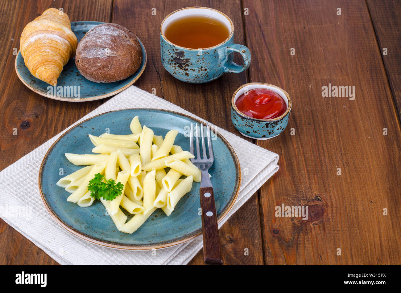 Boiled penne with ketchup Stock Photo - Alamy