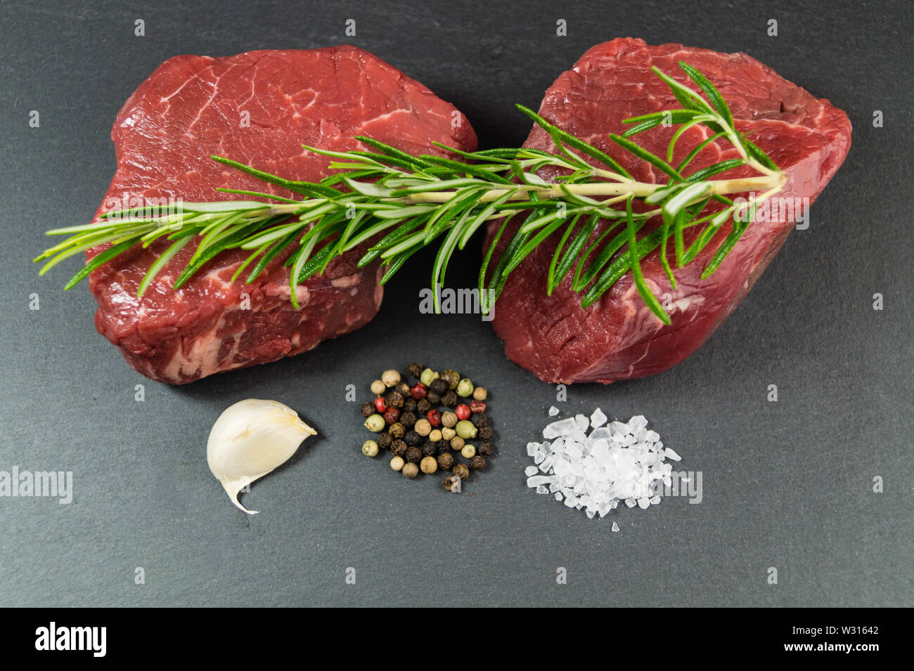 raw filet Steak with spices and vegetables Stock Photo - Alamy