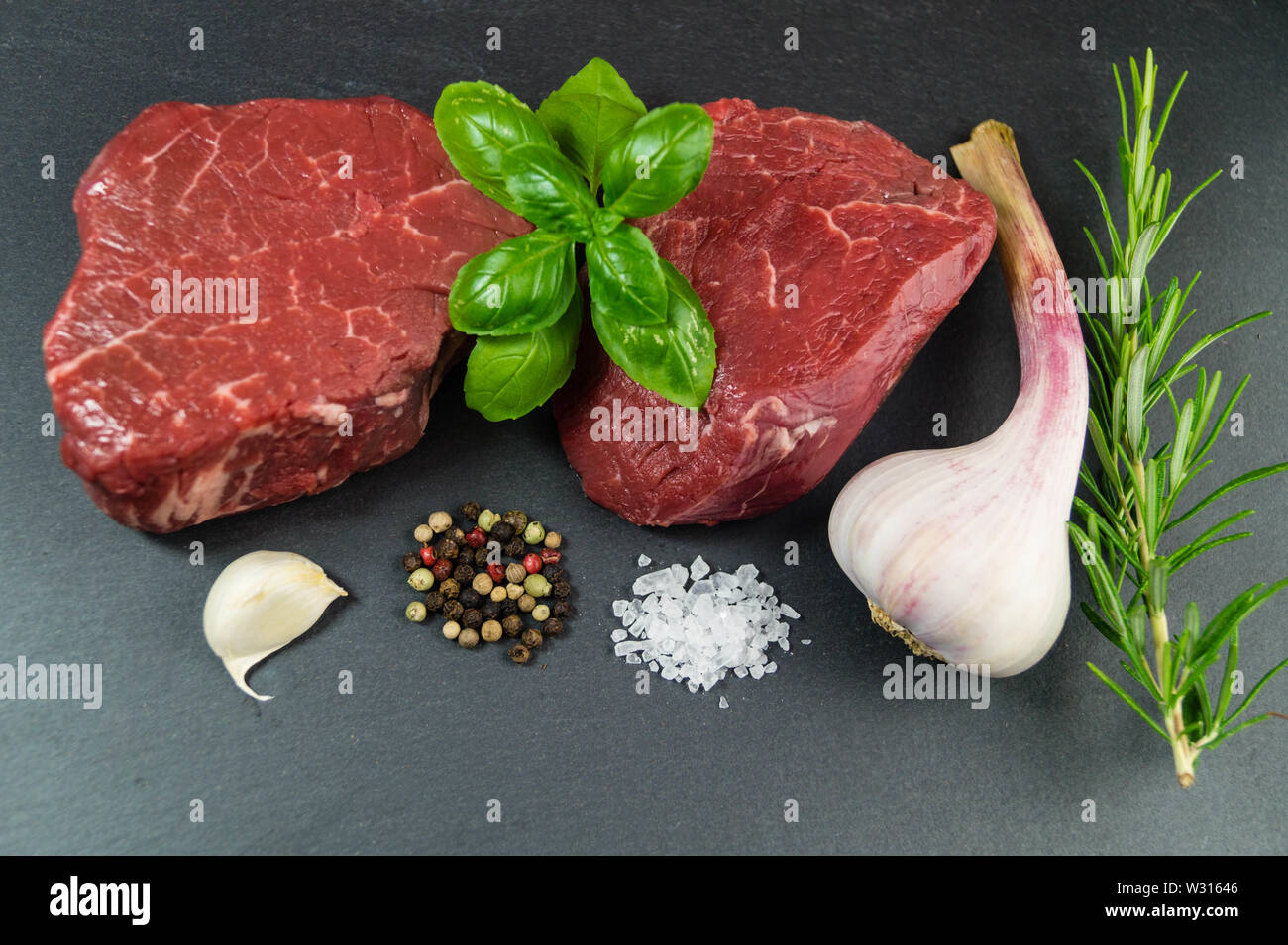 raw filet Steak with spices and vegetables Stock Photo - Alamy