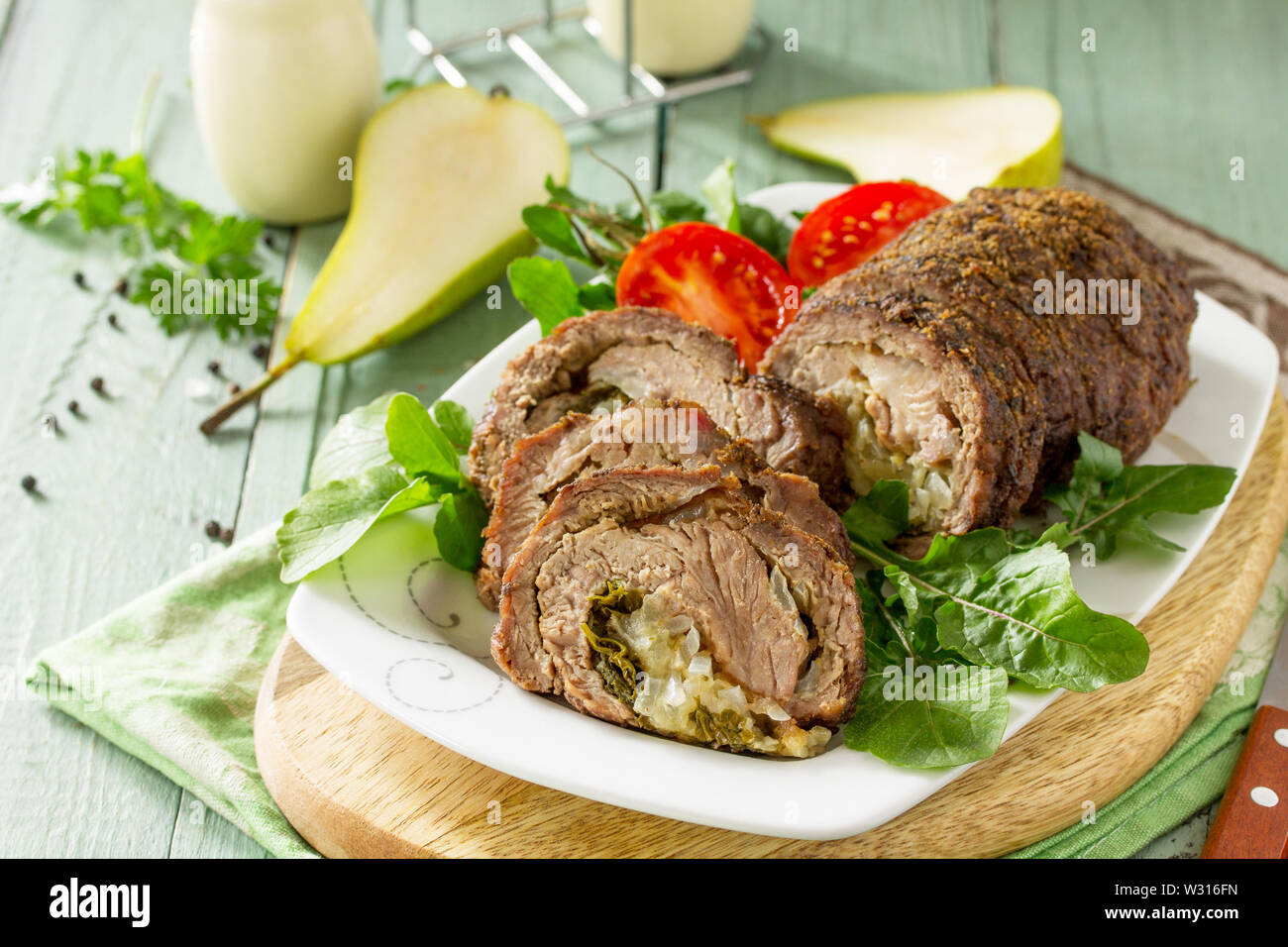 Stuffed Meat Roll with Pear and Cheese on a festive Thanksgiving Day ...
