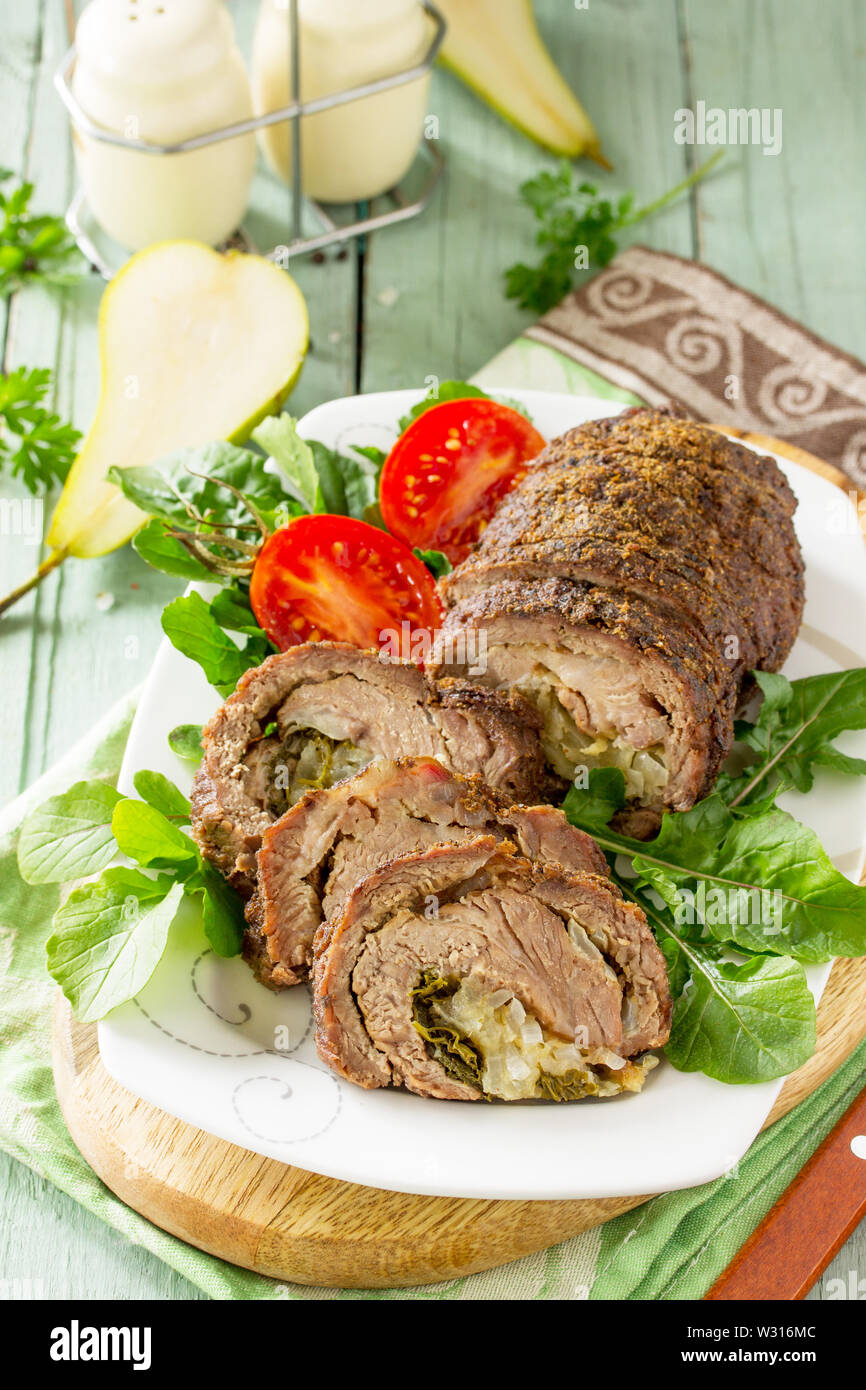 Stuffed Meat Roll with Pear and Cheese on a festive Thanksgiving Day ...