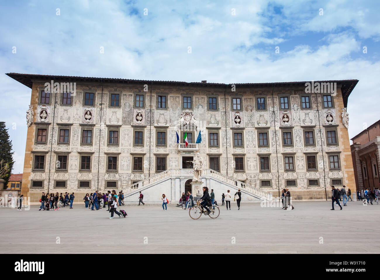 PISA, ITALY - APRIL, 2018: Tourists and locals at the Palazzo della ...