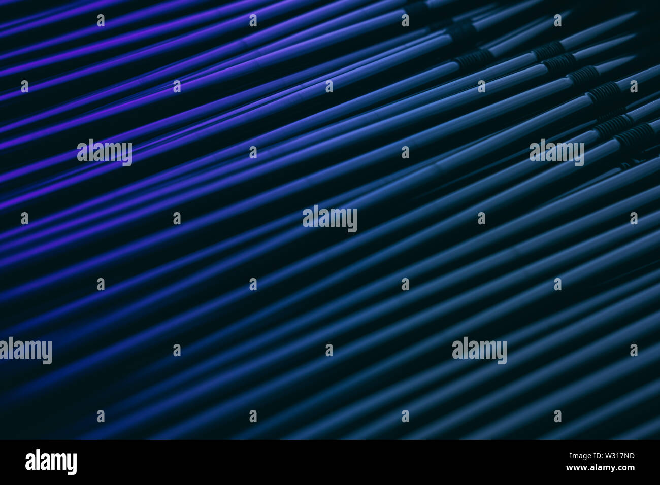 Stainless steel straws vertical abstract background. Metal pipes bundle ...