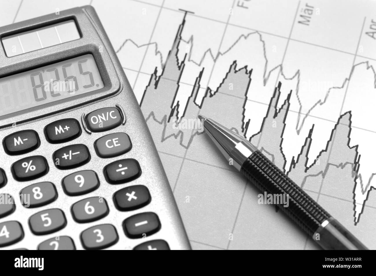 financial calculation with chart of stock market Stock Photo - Alamy
