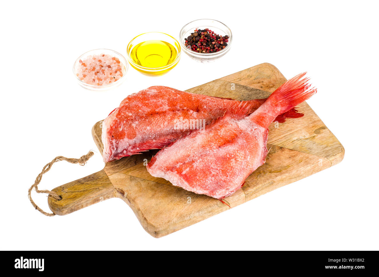 Frozen red sea bass Stock Photo - Alamy