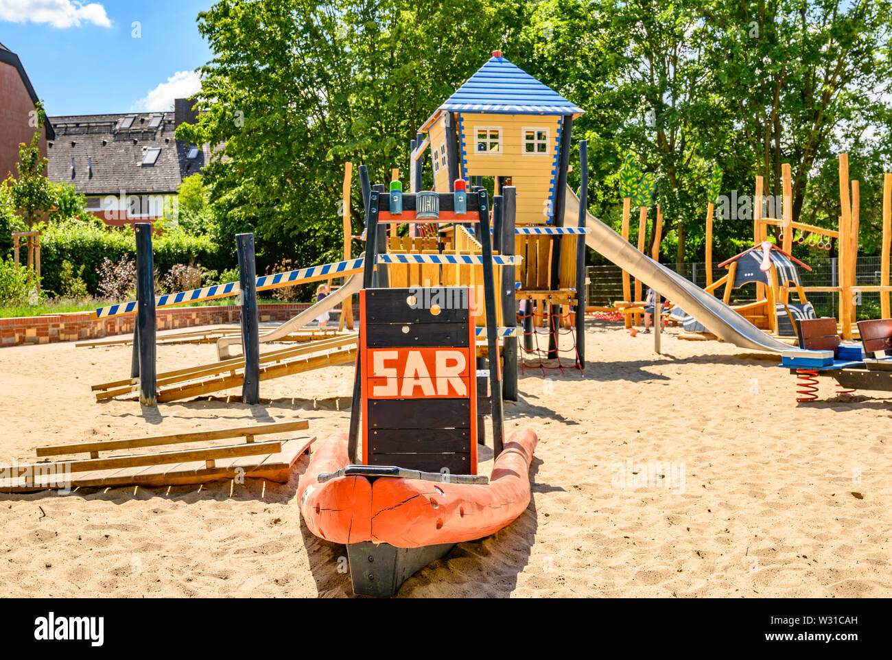 Berlin, Germany - July 11, 2019: Various wooden playground equipment on ...