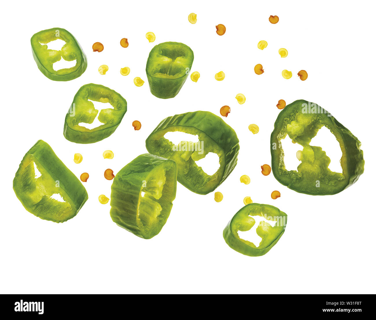 Fresh green chillies cut into rings and seeds. Isolated on white ...