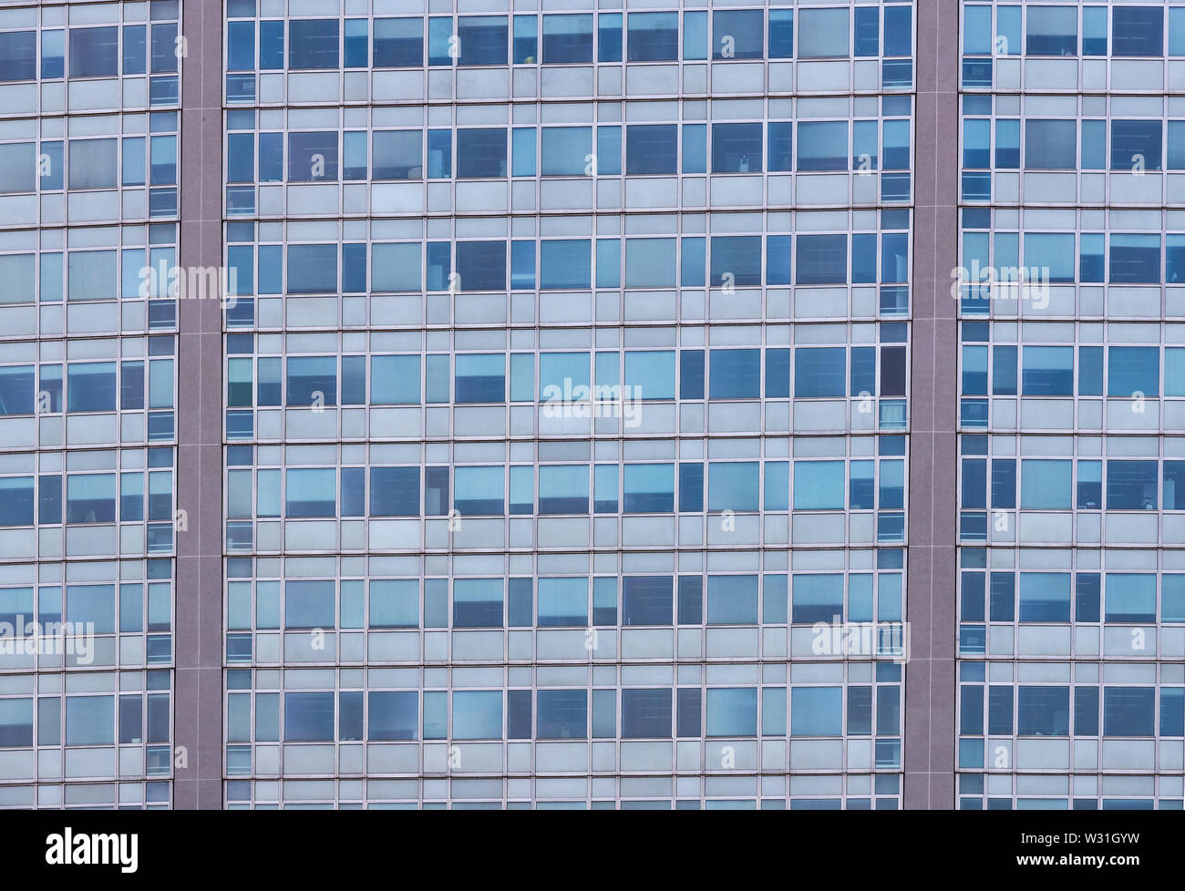 Background of the windows and balconies of the multi-storey building ...