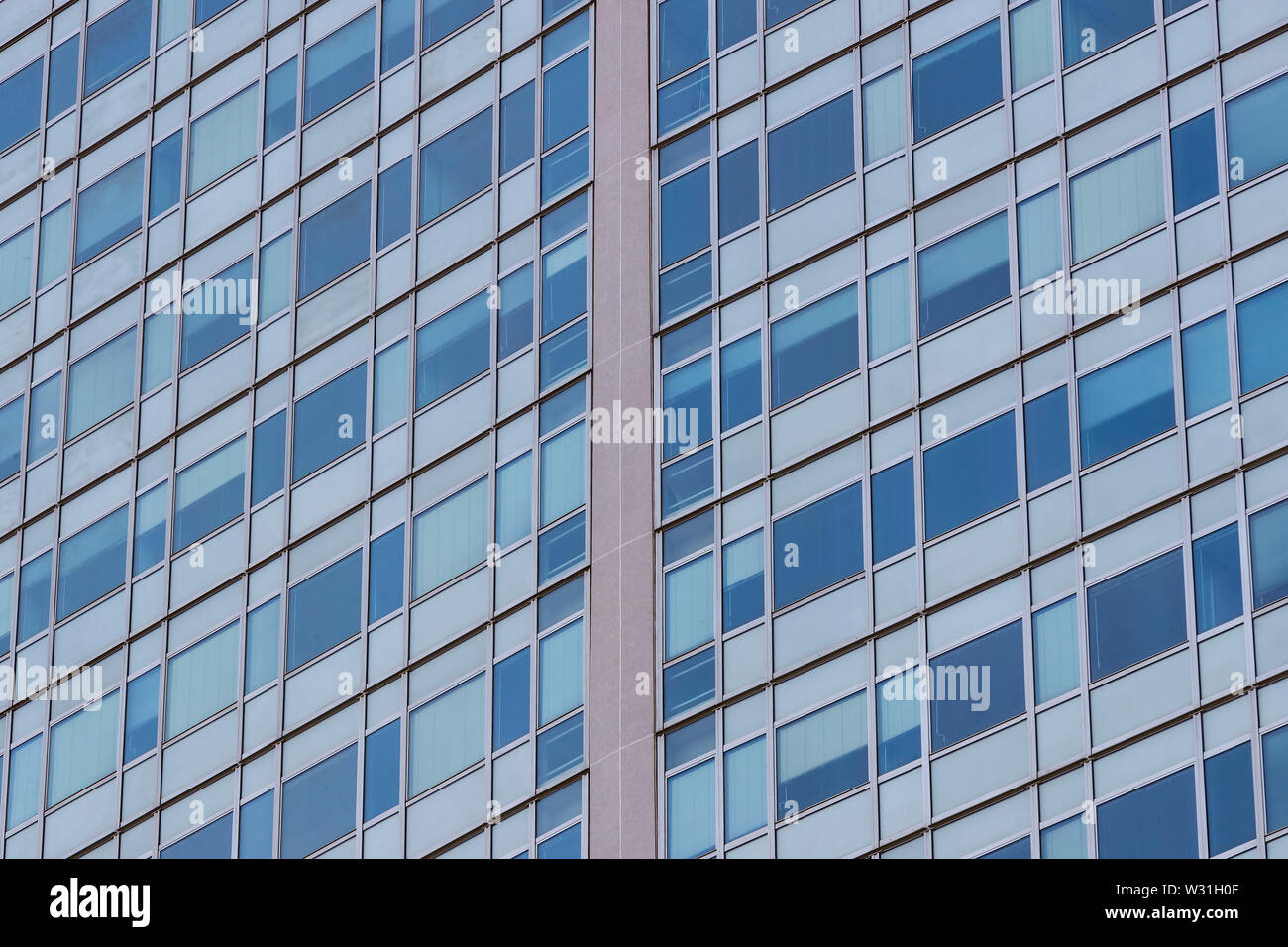 Background of the windows and balconies of the multi-storey building ...