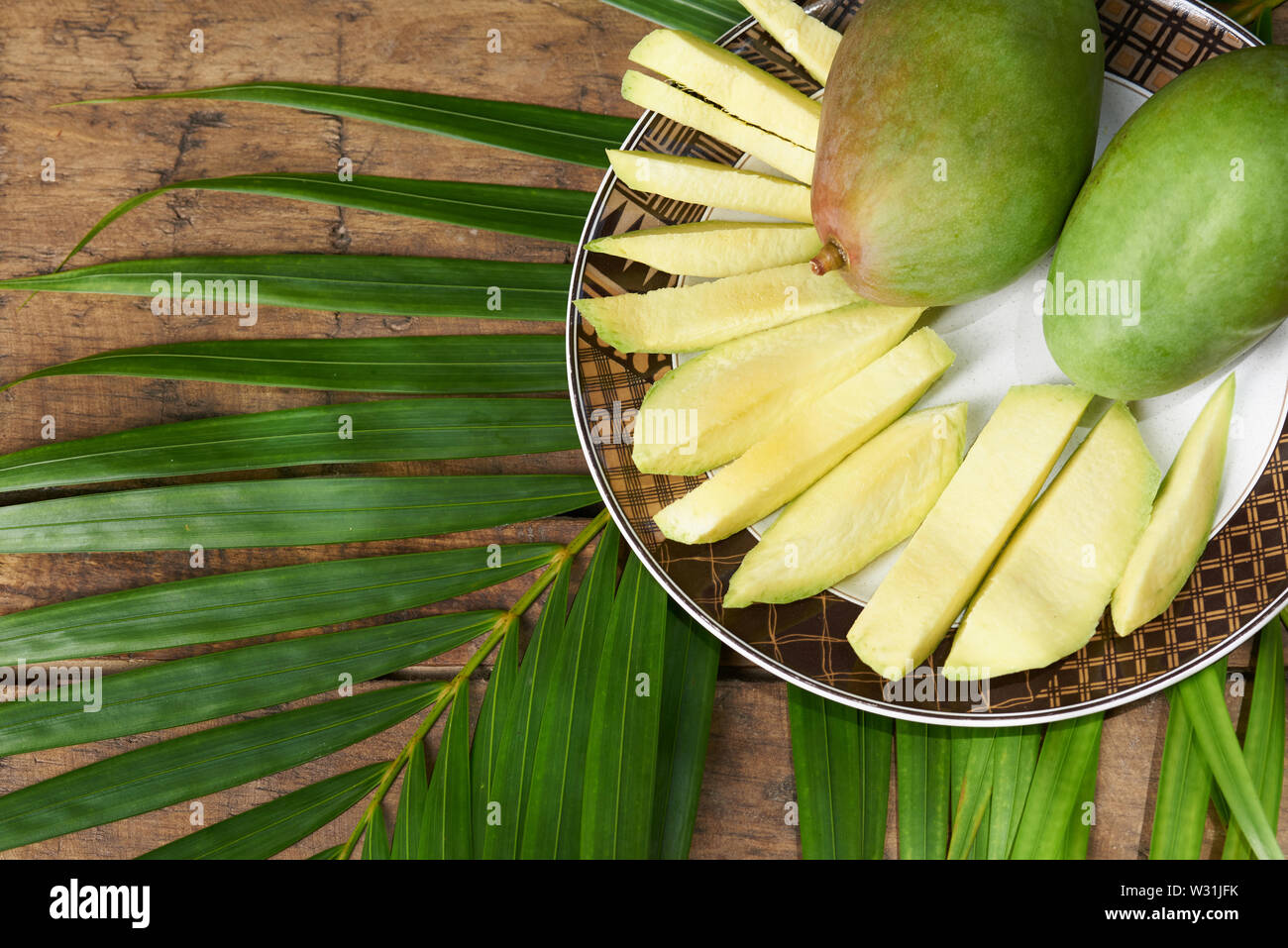 Raw mango slices hi-res stock photography and images - Alamy