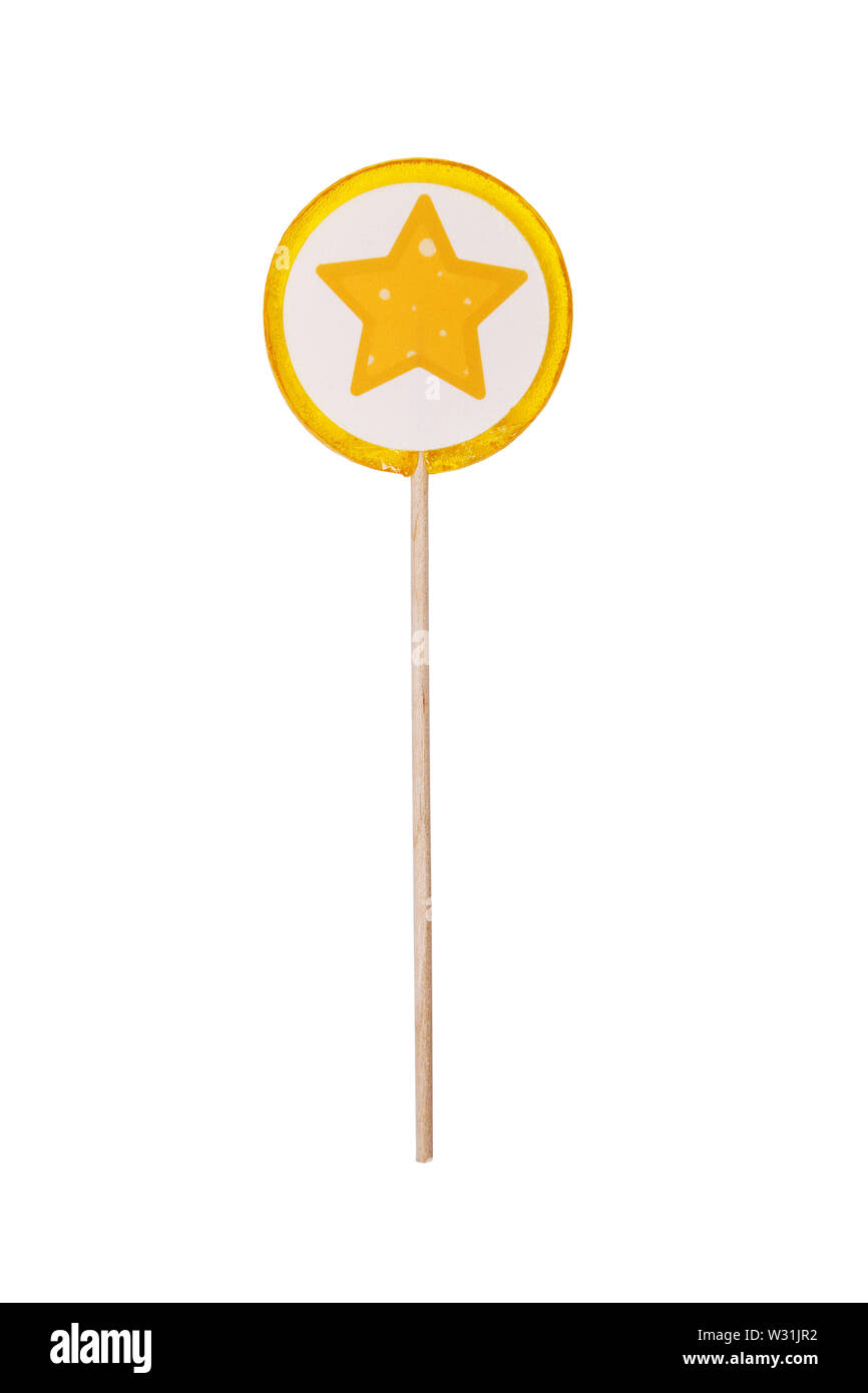 Lollipop with yellow star on white background close-up. Colorful ...