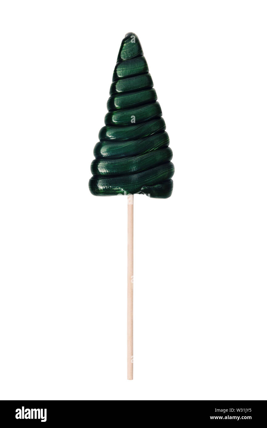 Candy in the shape of a Christmas tree on a white background. Green ...