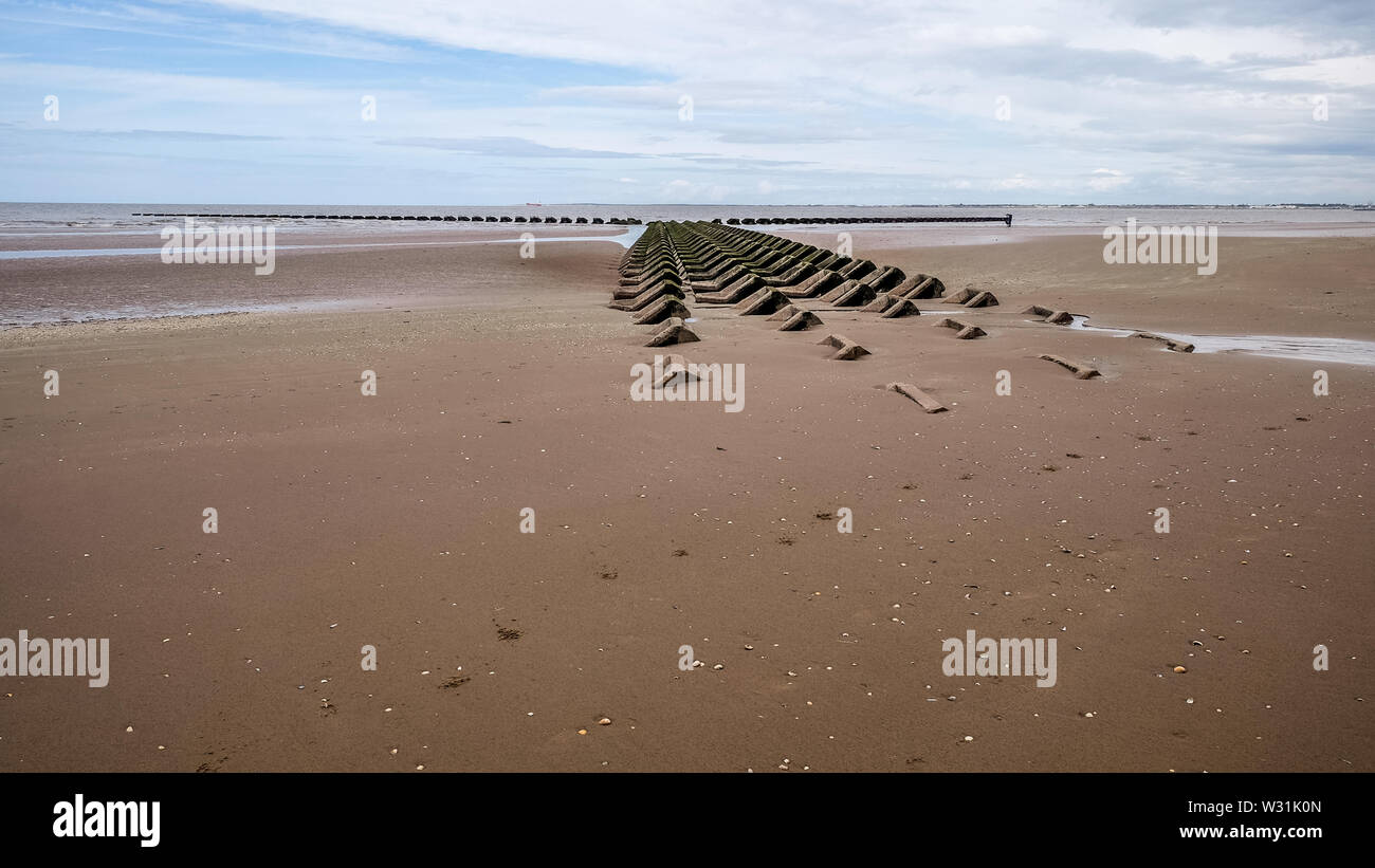 Groynes and sea defences at New Brighton Stock Photo - Alamy