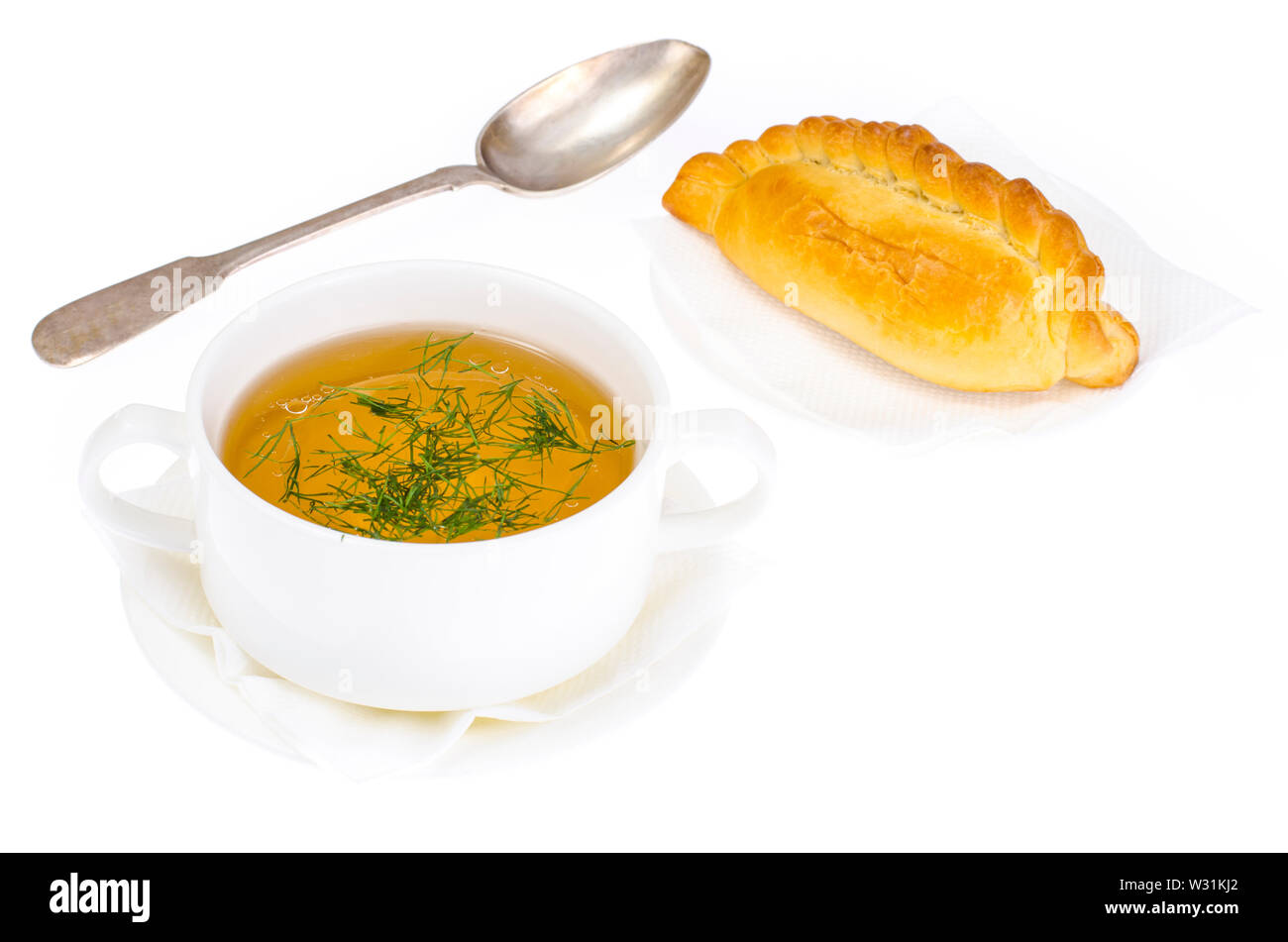 Meat broth with pie Stock Photo - Alamy