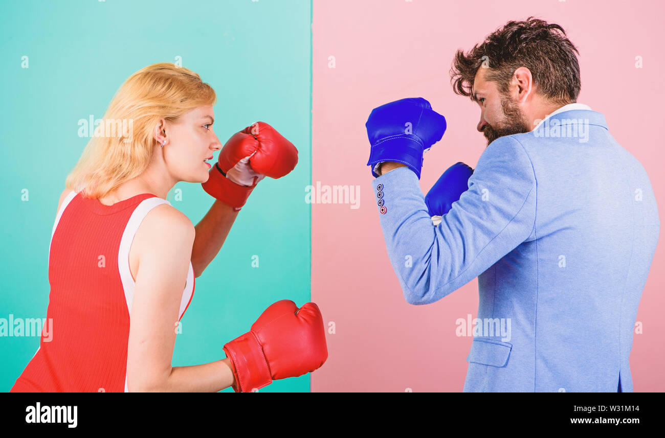 Man formal suit and athletic woman boxing fight. Couple in love ...