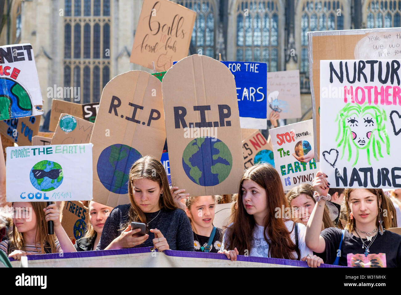 Bath college students and school kids carrying climate change placards ...