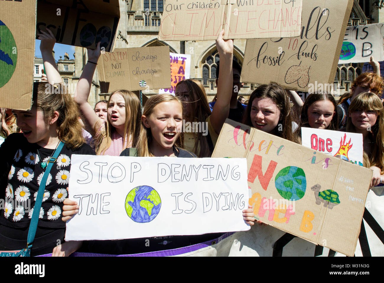 Bath college students and school kids carrying climate change placards ...