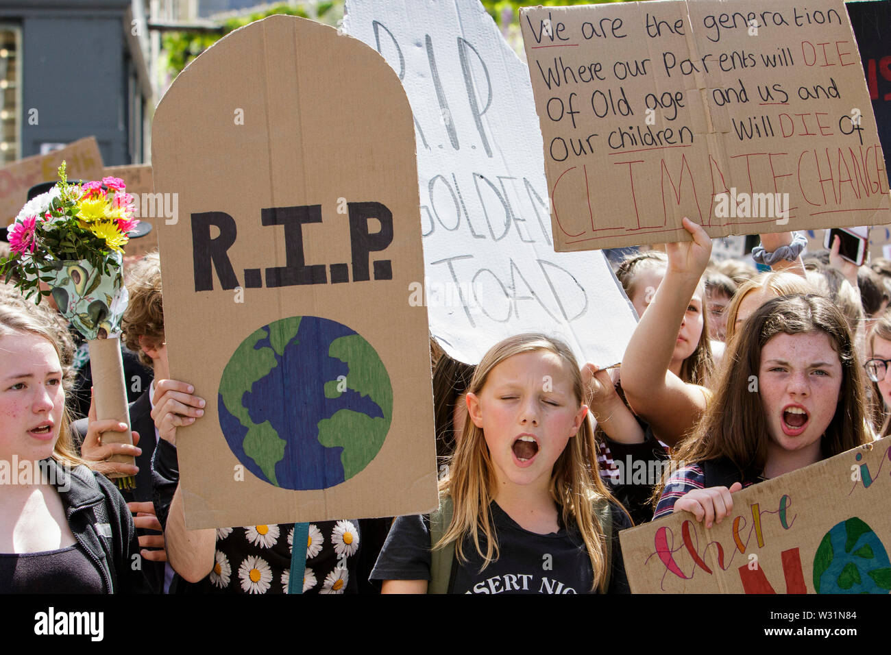 Bath college students and school kids carrying climate change placards ...