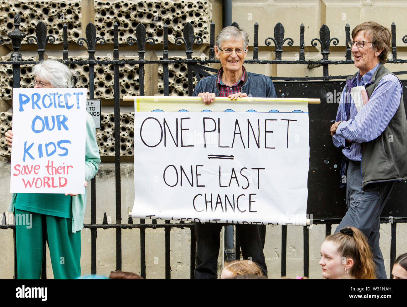 Bath college students and school kids carrying climate change placards ...