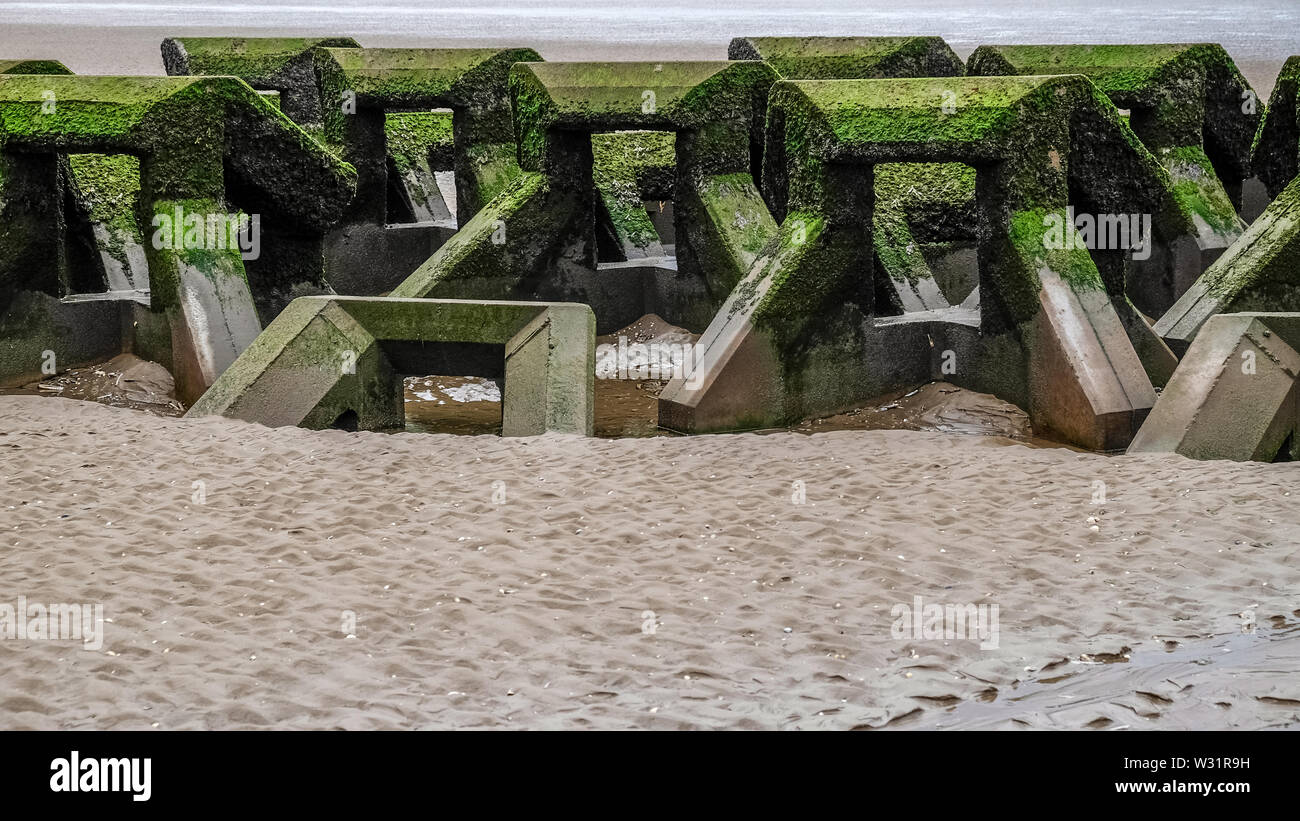 Groynes and sea defences at New Brighton Stock Photo - Alamy