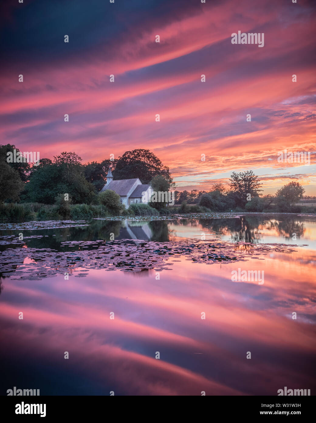 Landscape with a church on sunset hi-res stock photography and images ...