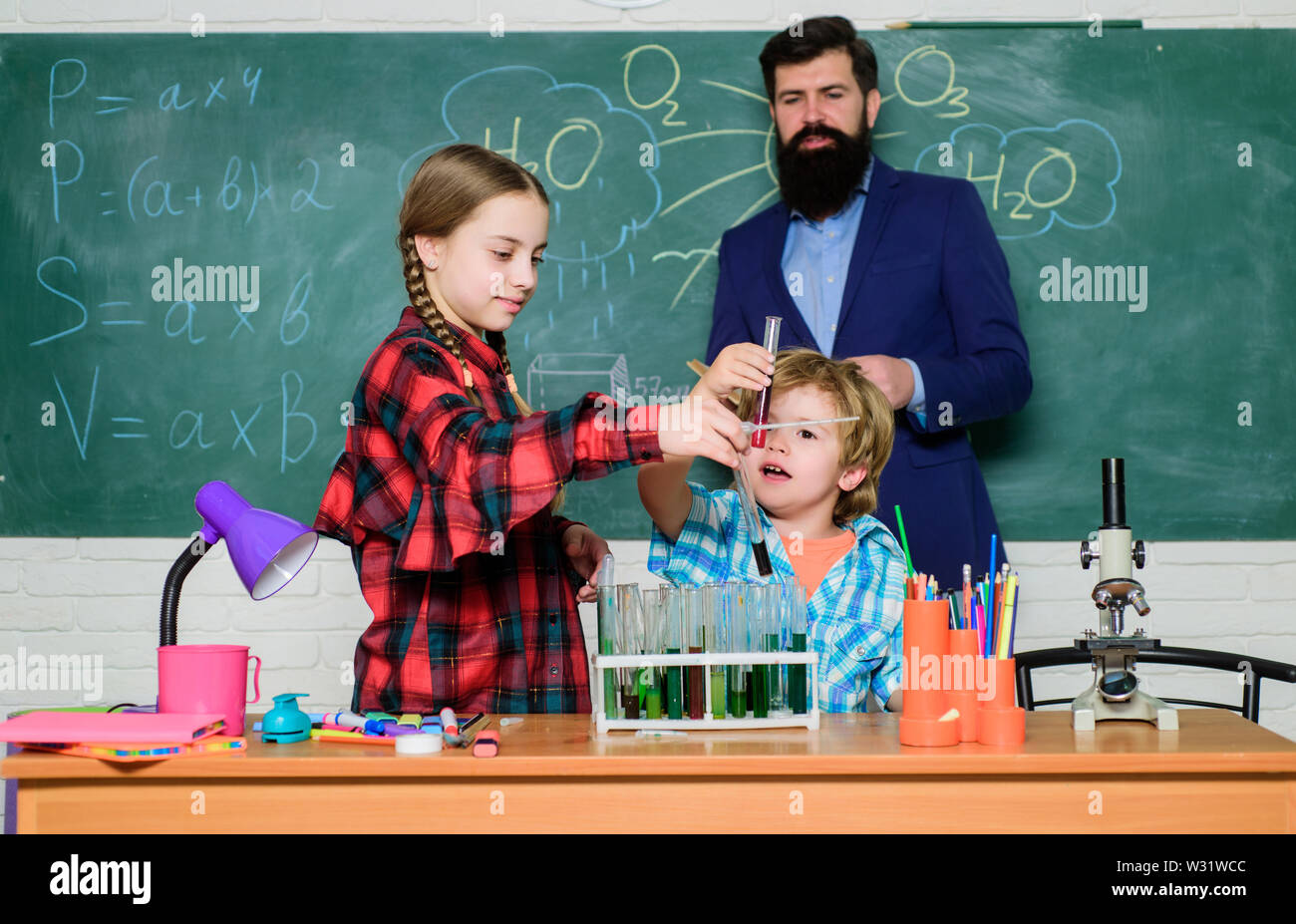 children making science experiments. Education. chemistry lab. happy ...