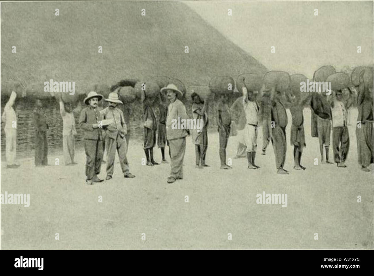 Rubber being bought at Bangassou, 1906 Stock Photo - Alamy