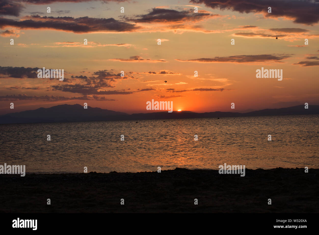 Sunset on the sea Stock Photo - Alamy