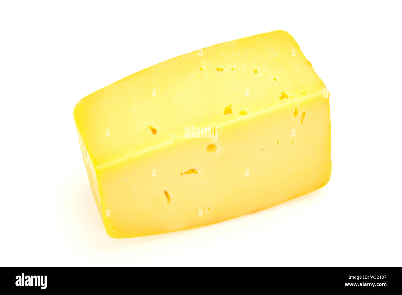 Swiss Hard yellow tasty cheese brick Stock Photo - Alamy