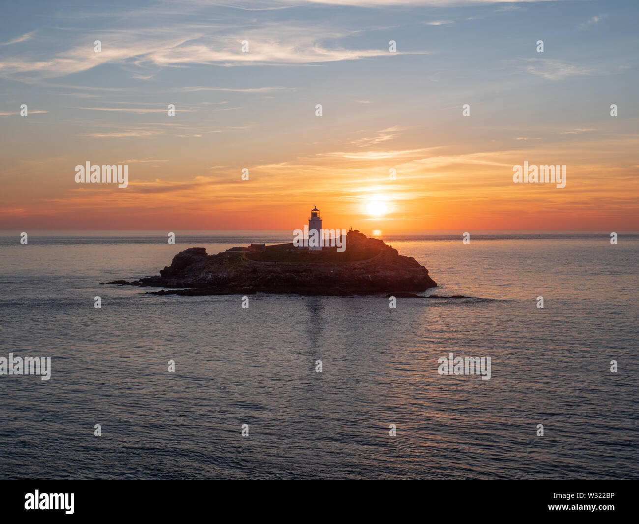 Godrevey Lighthouse at Sunset (2 Stock Photo - Alamy
