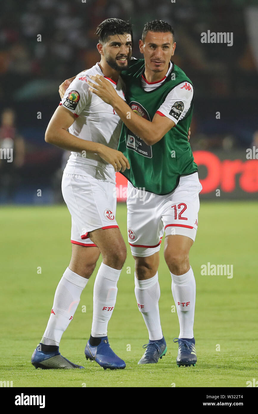 Cairo, Egypt. 11th July, 2019. Tunisia's Ferjani Sassi (L) celebrates ...