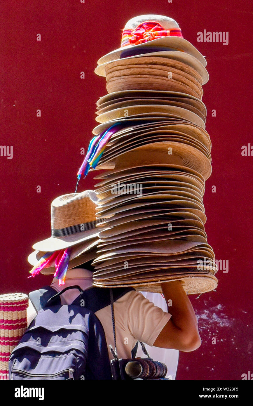 Street vendor with hats Stock Photo - Alamy