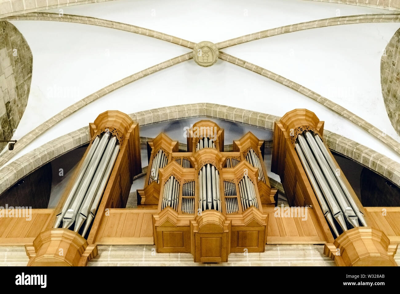 Large organ with metal pipes inside a church to play solemn pieces ...