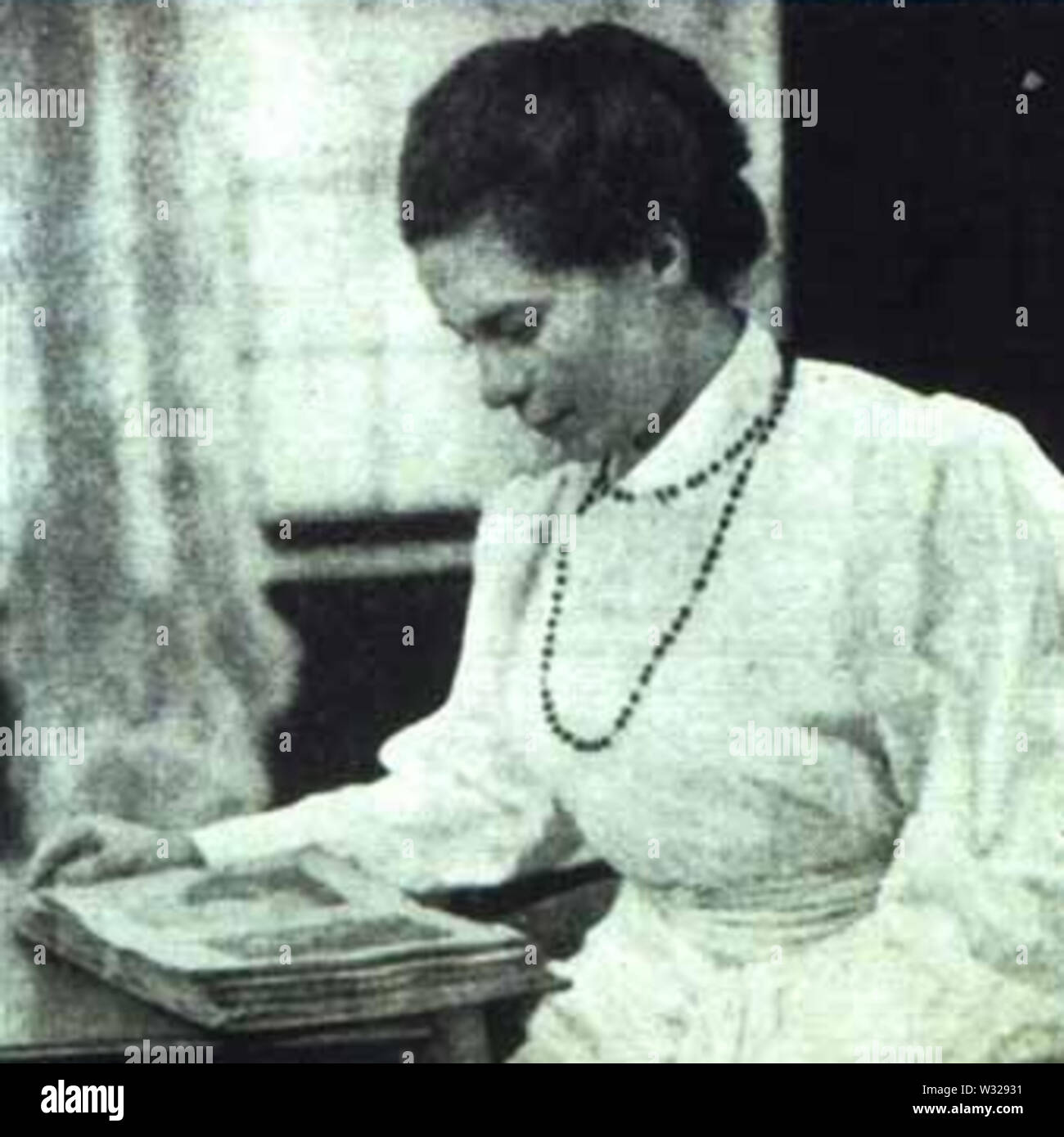 Sister Nivedita reading a book Stock Photo - Alamy