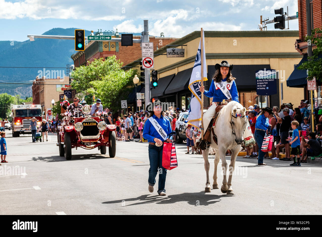 Rodeo Queen riding her horse; Annual Fourth of July Parade in the small ...