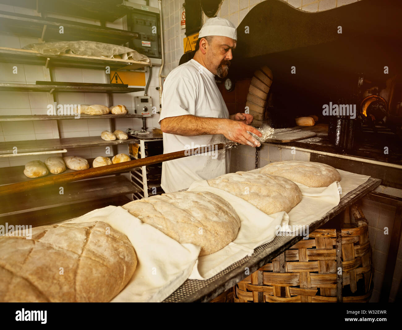 Daily production of bread baked with wood oven with traditional method ...