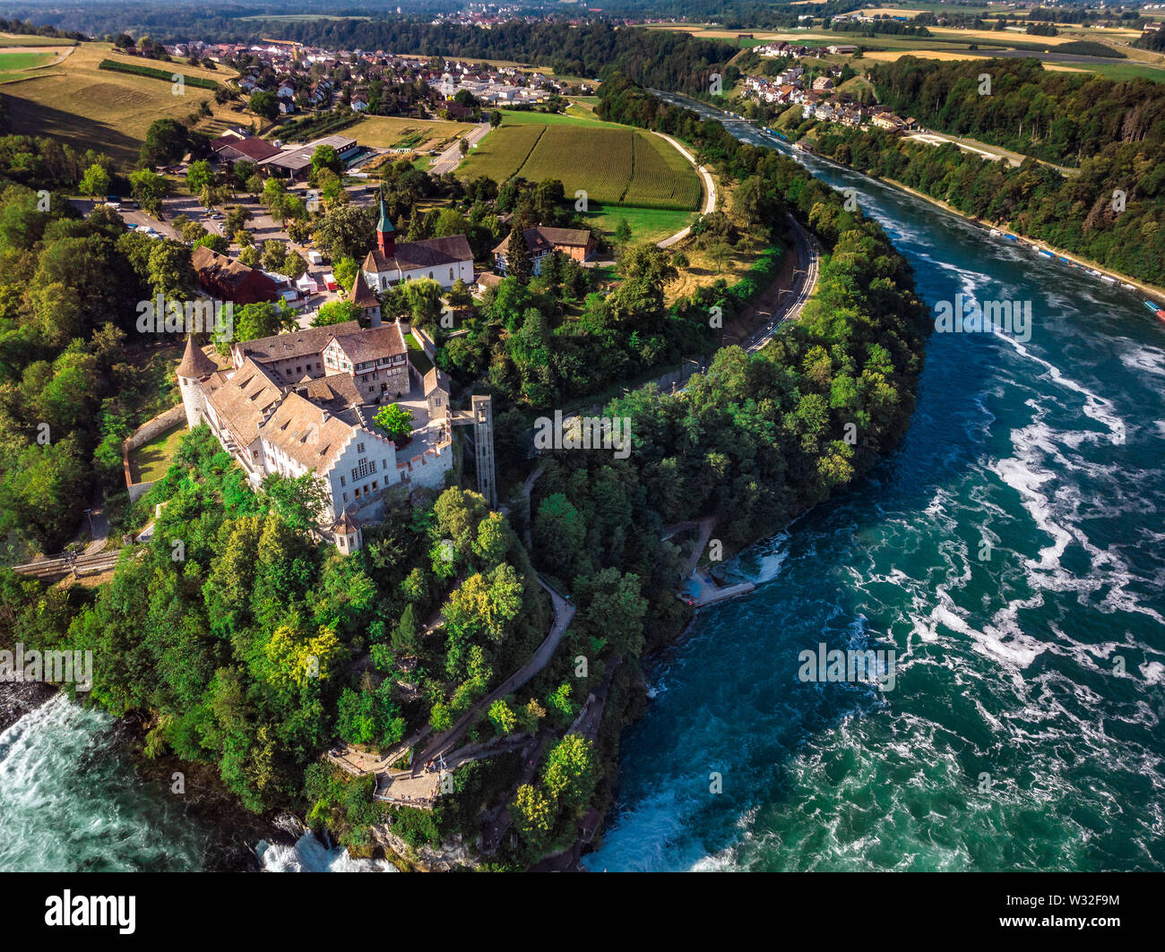 Rhine Falls (Rheinfall) waterfalls with Schloss Laufen castle ...