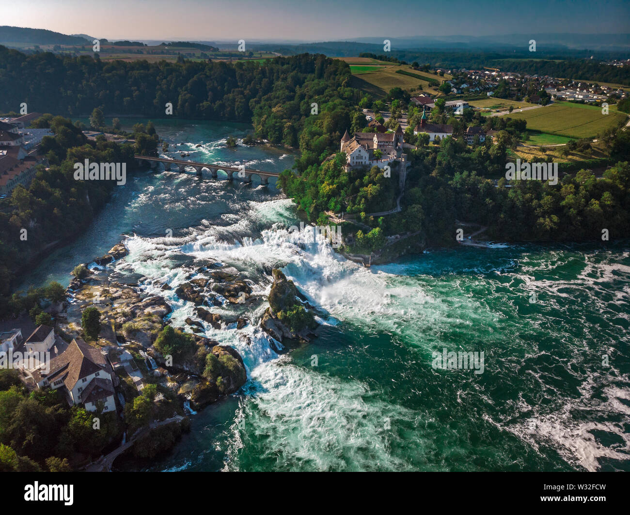 Rhine Falls (Rheinfall) waterfalls with Schloss Laufen castle ...
