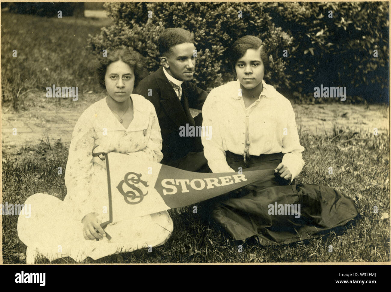 Isabelle Stewart, Raymond McNeal, and Odetta Johnson sit on the lawn at ...