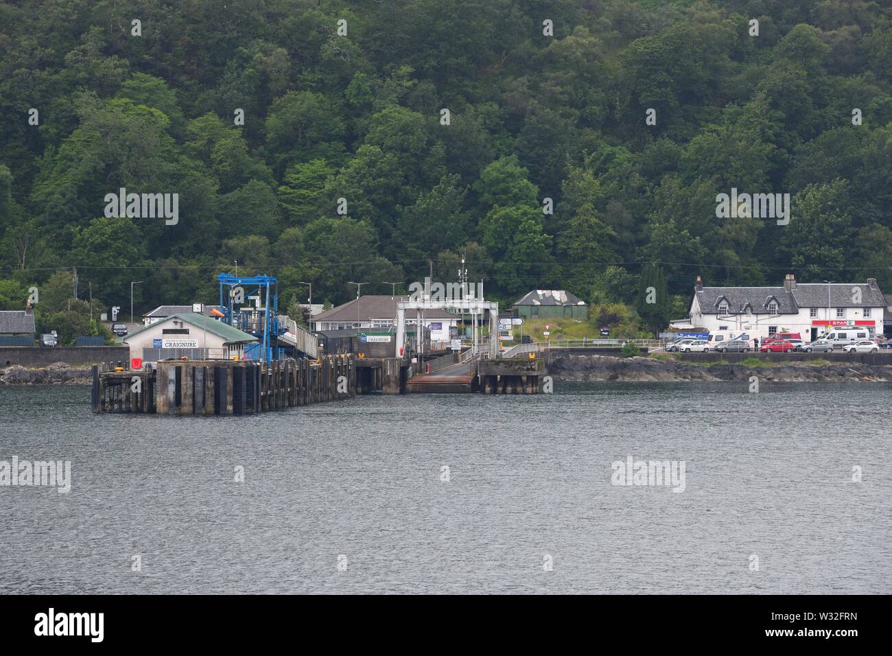 The approach to the Caledonian MacBrayne ferry terminal and pier at ...