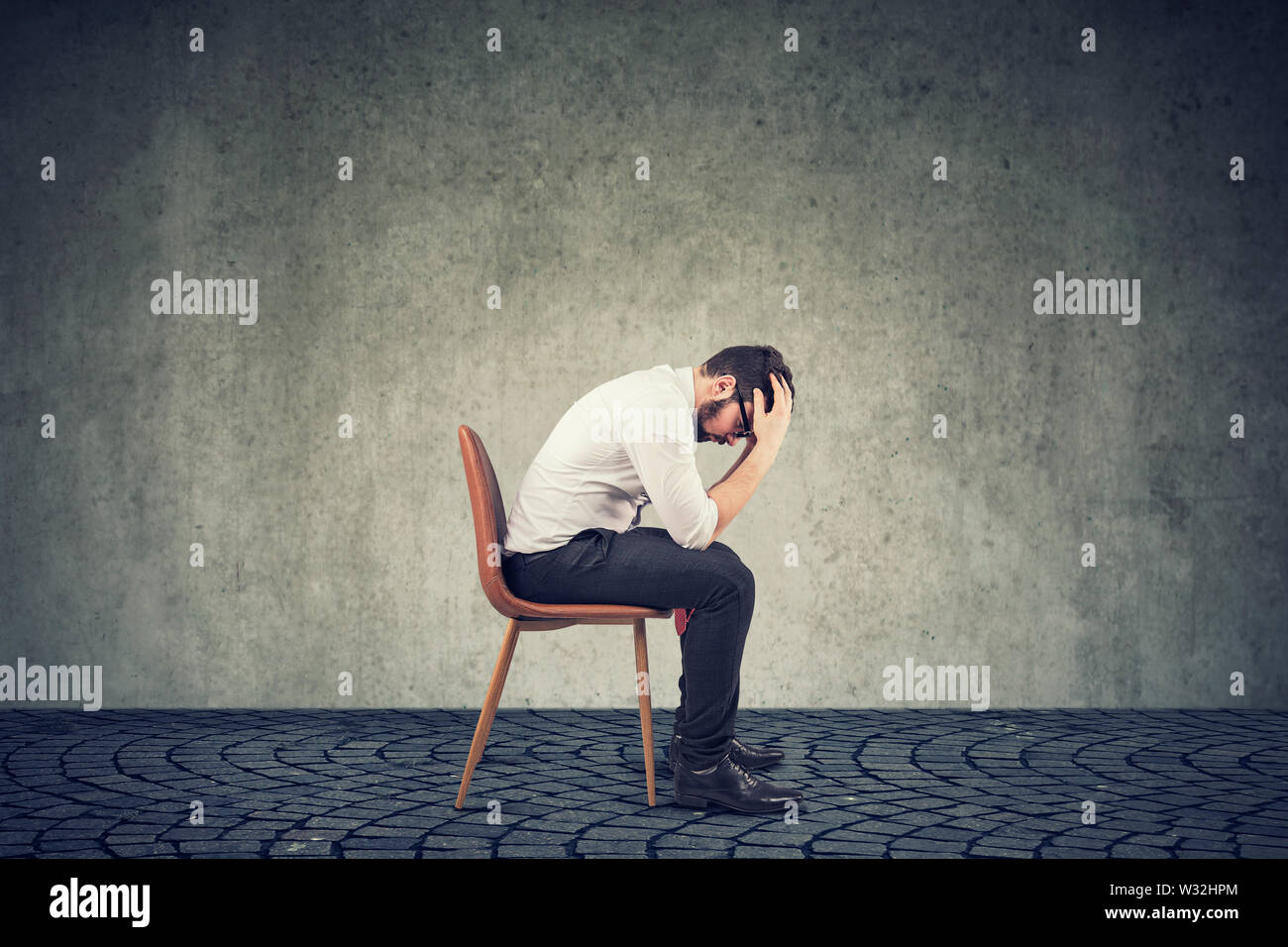 Sad Person Sitting Alone Wallpaper