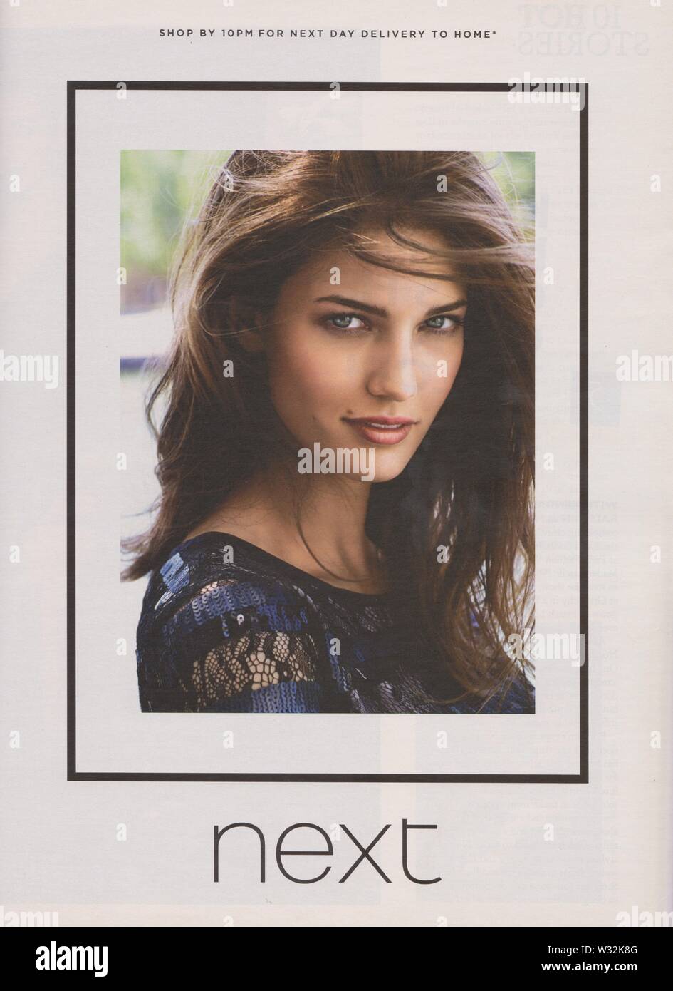 poster advertising Next fashion house with Kendra Spears in paper ...