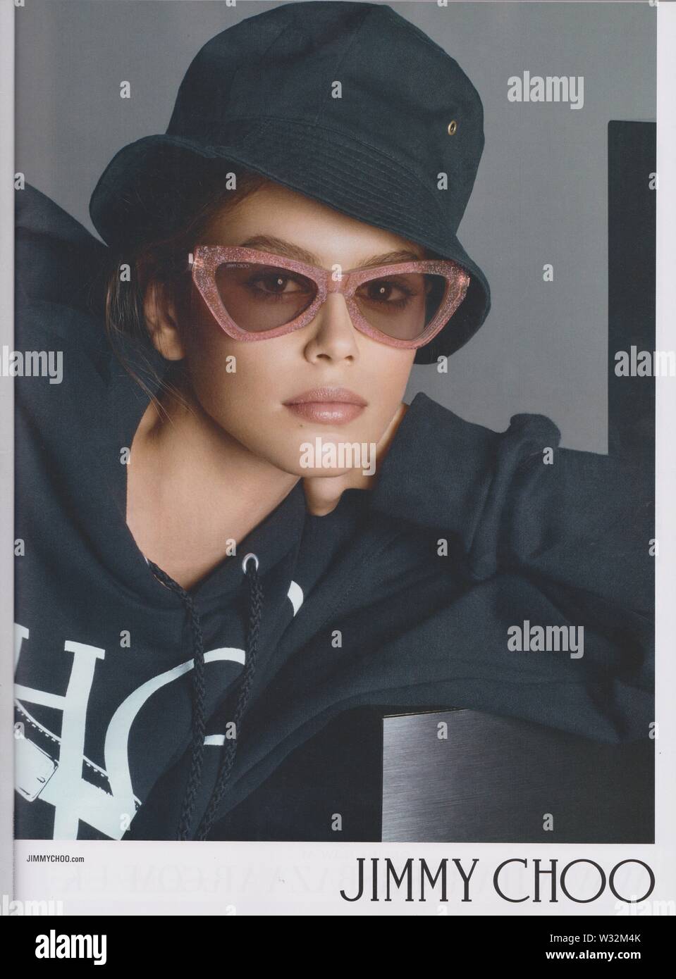 poster advertising Jimmy Choo fashion footwear house with Kaia Gerber ...