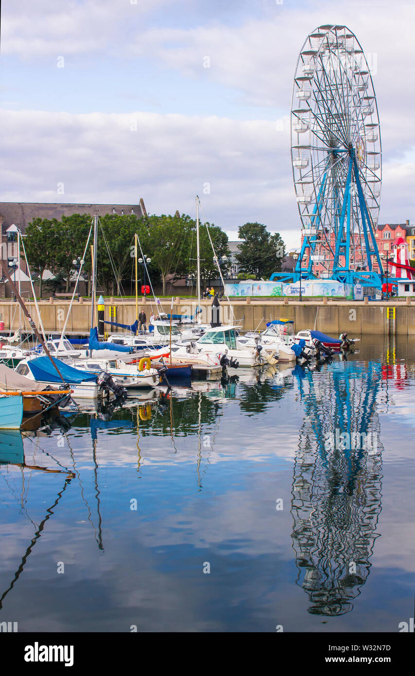 11 July 2019 A large temporary ferris Wheel at the seafront marina in ...