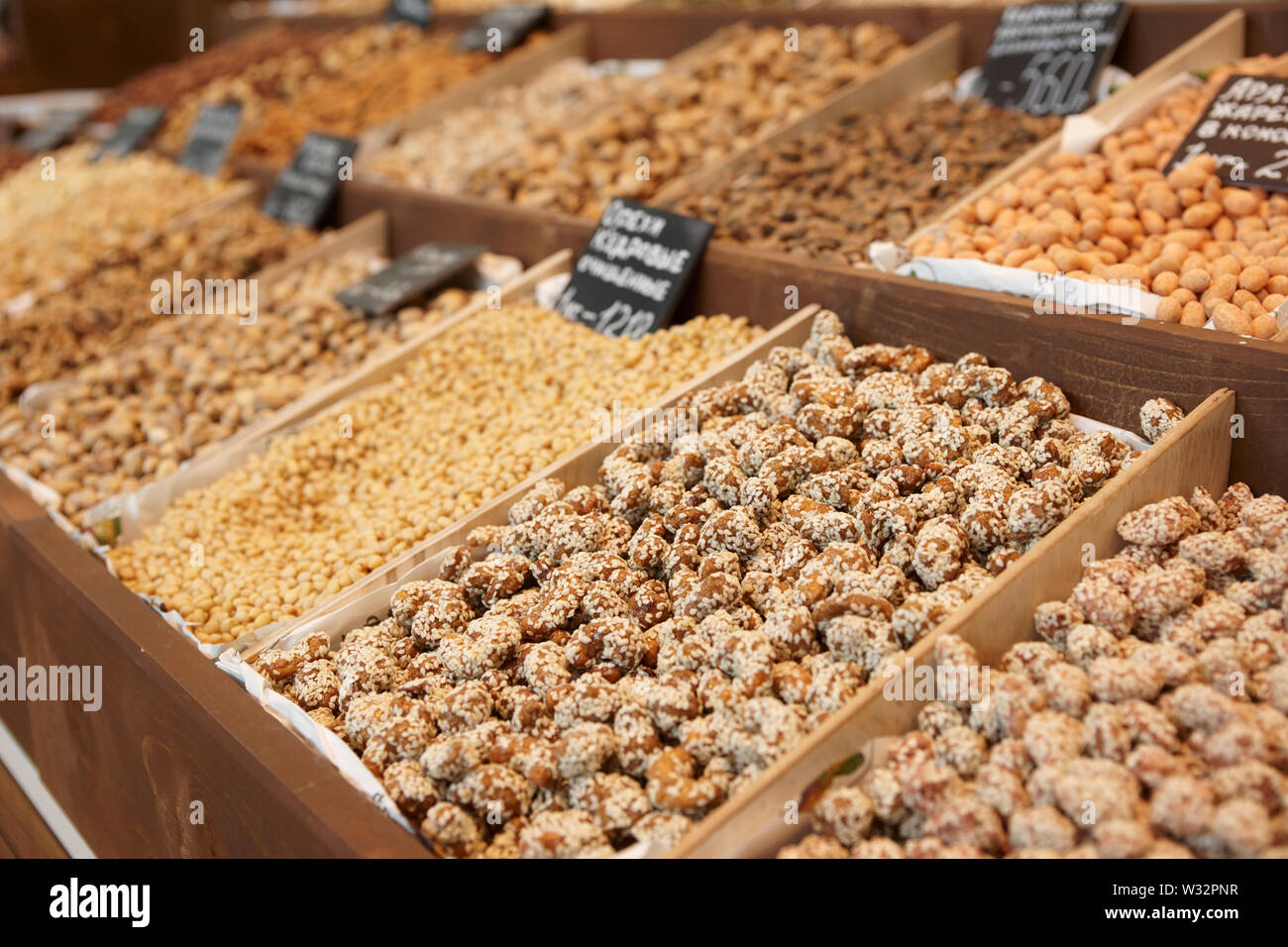 Variety of nuts on street market, limited focus Stock Photo - Alamy