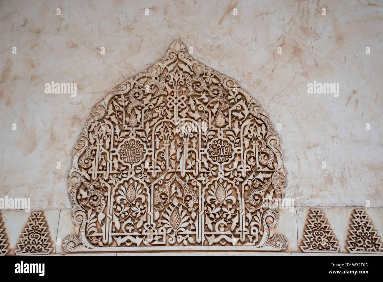 Hand carved patterns on the walls of the Alhambra in Granada, Spain ...