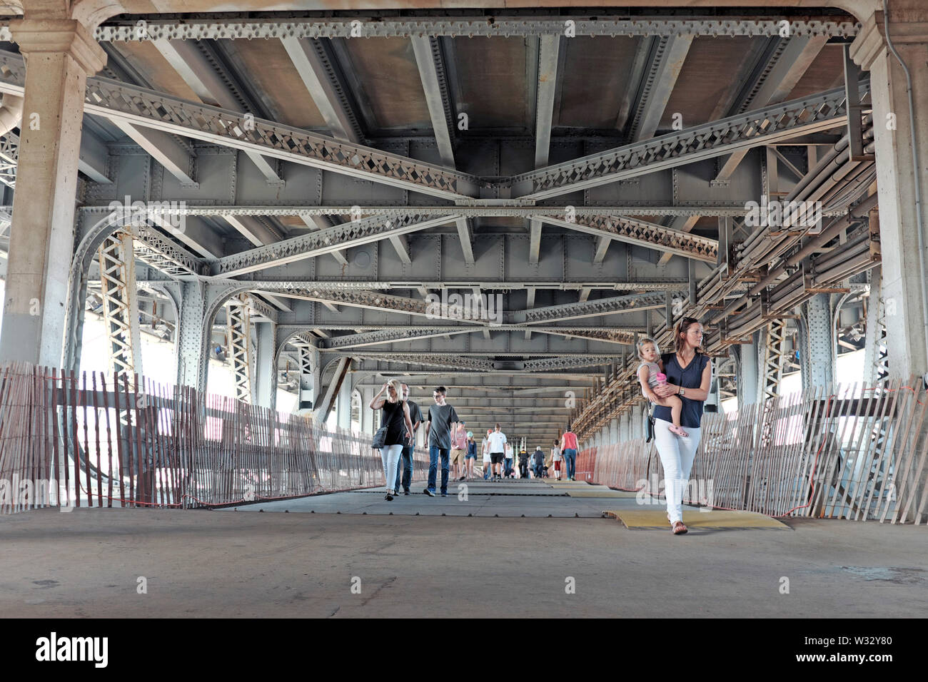 Visitors to the lower-level of the Veterans Memorial Bridge enjoy the ...