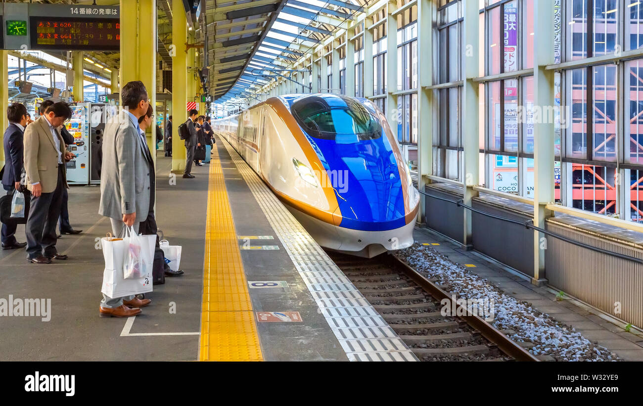 Tokyo, Japan - April 27 2018: Japanese Shinkansen high speed train at a train station Stock ...