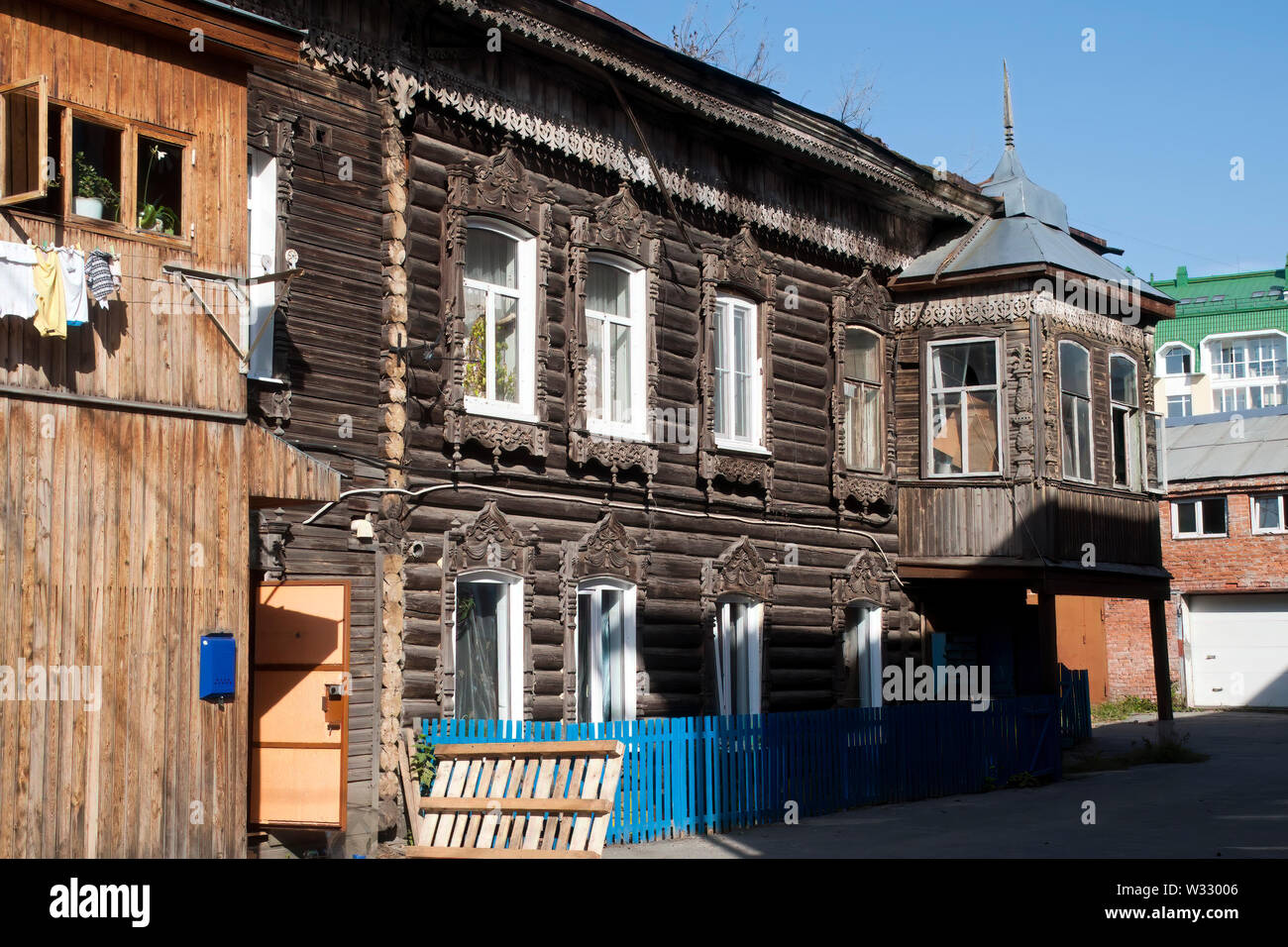 Tomsk Russia, street scene with traditional wooden houses Stock Photo ...